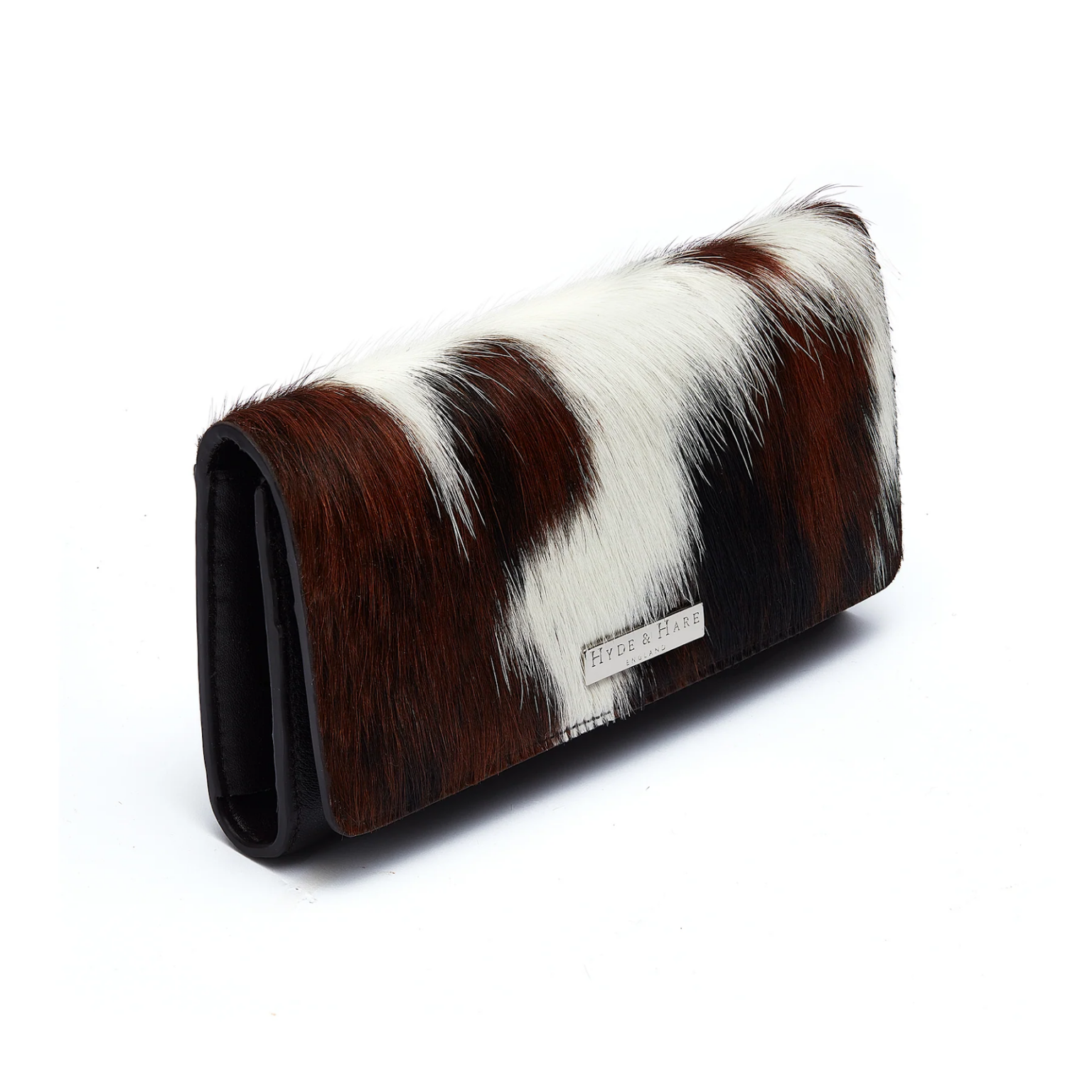 Why You Should Consider Adding Cowhide Purses and Bags to Your ...